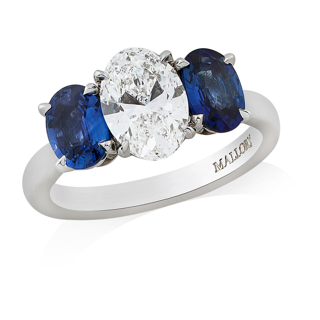 Mallory Victoria Platinum Three Stone Claw Set Oval Cut Diamond and Ov